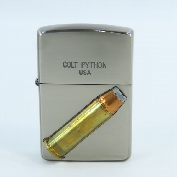 ZIPPO/ジッポー COLT PYTHON USA/コルトパイソン 銃弾/弾丸 メタル貼り 古美加工 94年製の買取実績 - ブランド買取専門店リアクロ