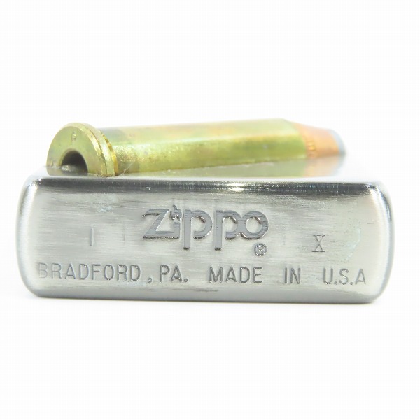 ZIPPO/ジッポー COLT PYTHON USA/コルトパイソン 銃弾/弾丸 メタル貼り 古美加工 94年製の買取実績 - ブランド買取専門店リアクロ